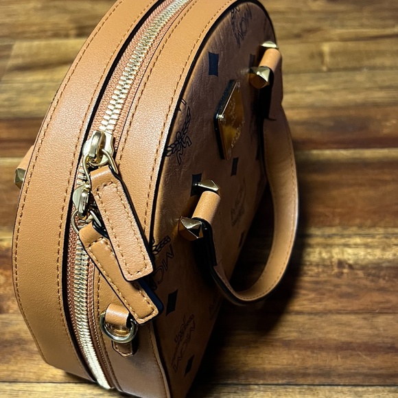 MCM | Bags | Rare Mcm Signature Cognac Diamond Logo Leather Mini Round ...